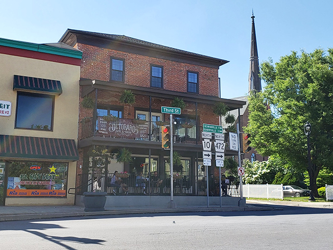 This charming brick facade on Third Street whispers "come inside" with the confidence of a place that's earned its reputation.
