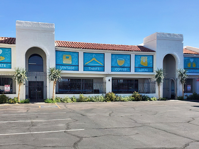 The pristine white exterior of Thrift to Thrive beckons like a siren song to bargain hunters. Those blue window panels aren't just decorative&mdash;they're portals to treasure hunting paradise.