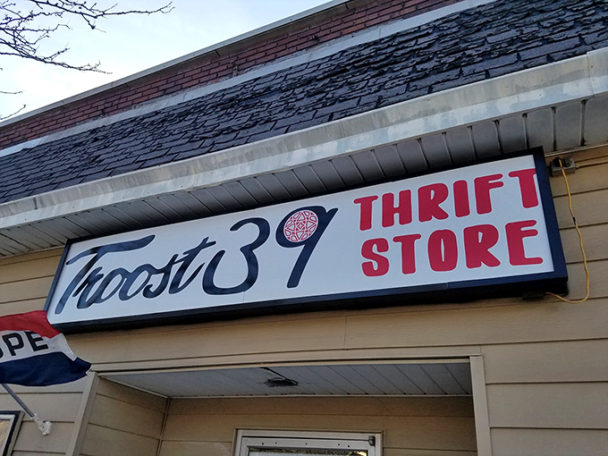 The unassuming storefront of Troost39 beckons with its bold red lettering &ndash; fashion paradise disguised as a humble thrift shop. 