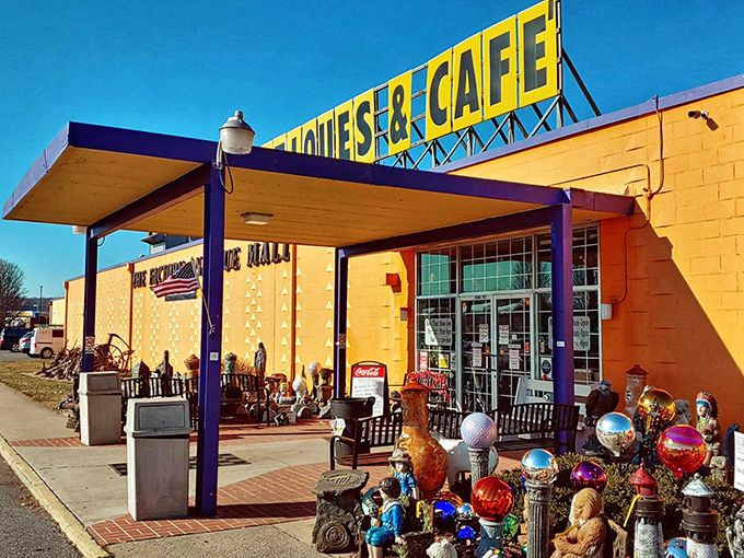 The sunshine-yellow exterior isn't subtle, but neither are the treasures inside. Factory Antique Mall announces itself like a vintage Vegas marquee.