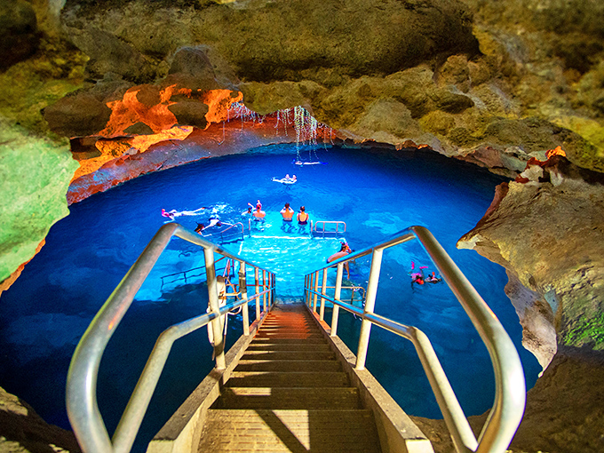 The entrance to another world awaits at the bottom of these stairs. Mother Nature's own light show illuminates this underground oasis.