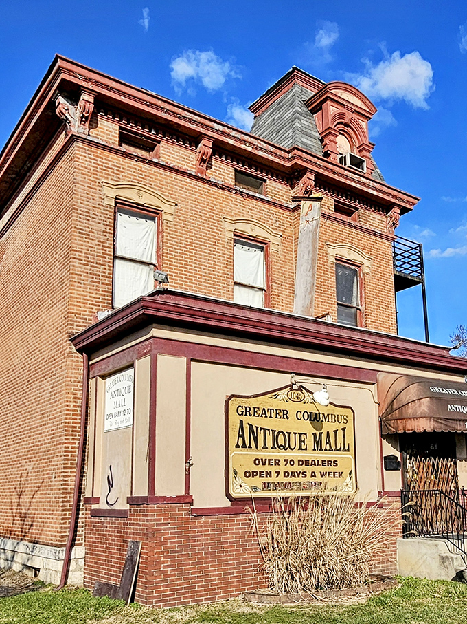 The historic red brick fa&ccedil;ade of Greater Columbus Antique Mall stands as a time capsule in Columbus' Brewery District, inviting treasure hunters with its vintage charm.