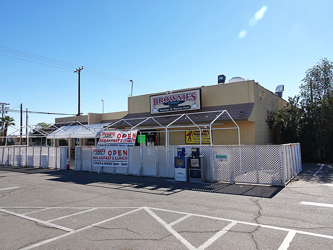 The unassuming facade of Brownie's Diner in Brawley stands like a time capsule in the California desert, beckoning hungry travelers with promises of breakfast bliss.