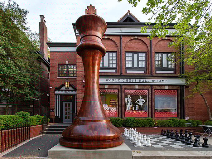 This stately brick facade whispers "serious chess business" while somehow making everyone feel welcome inside.