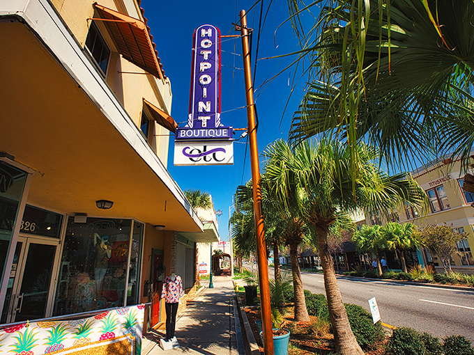 Downtown Titusville's Midpoint Boutique stands as a colorful beacon of small-town charm, where palm trees and blue skies create Florida's version of Main Street perfection.