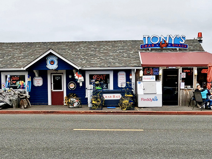 Sunset magic at Tony's Crab Shack, where the weathered blue exterior and quirky nautical decor hint at the seafood treasures waiting inside.