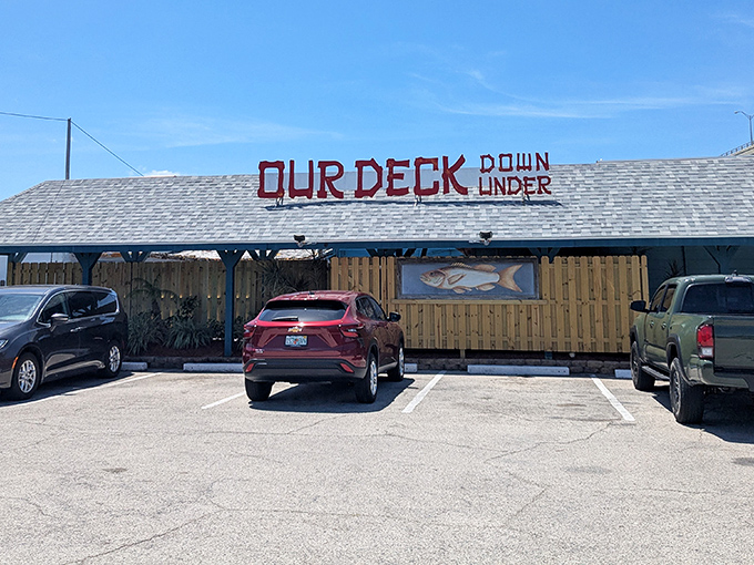 The unassuming entrance to seafood paradise. Like all great Florida treasures, Our Deck Down Under hides in plain sight, promising nautical delights beneath the bridge.
