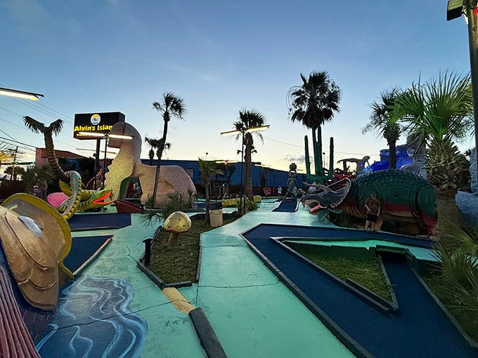 Twilight transforms Goofy Golf into a magical kingdom where dinosaurs roam and palm trees sway against the Florida sky. Mini-golf nostalgia at its finest!