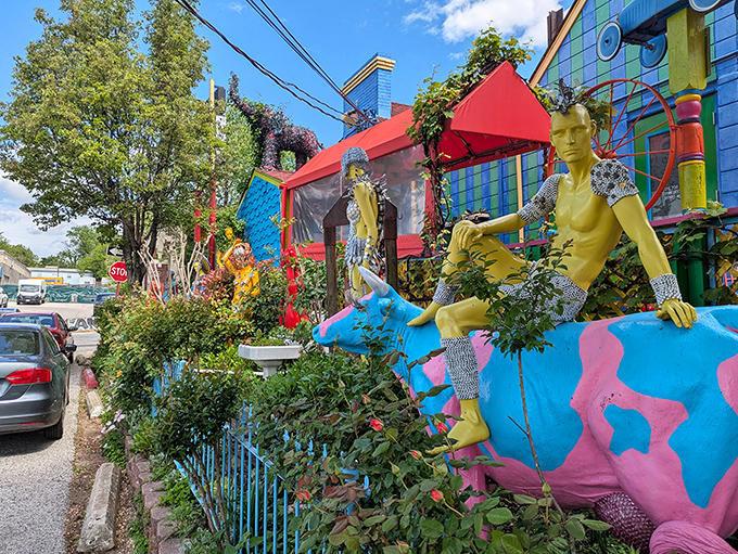 The exterior of PaperMoon Diner looks like a toy store had a beautiful collision with a paint factory. Mannequins and vibrant colors announce: normal dining, this is not.