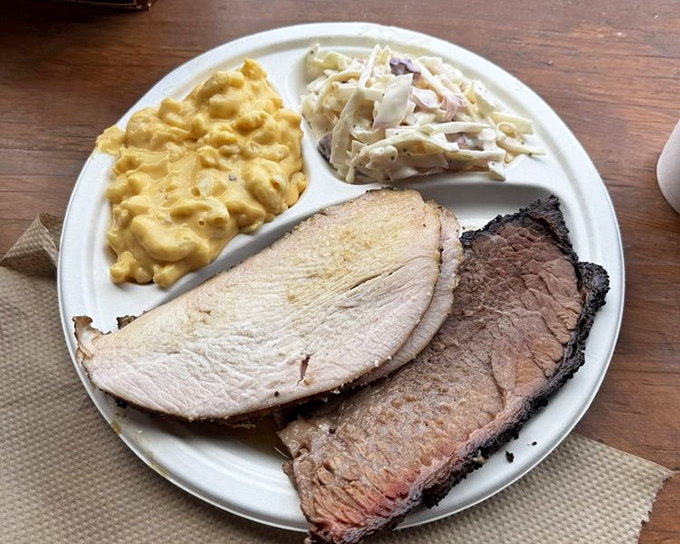 A plate that answers the eternal question, "Why choose one meat when you can have two?" Plus sides that know their supporting role perfectly.