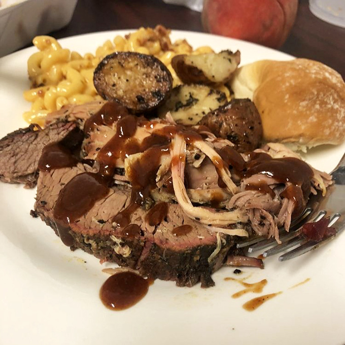 A plate that answers the eternal question: "Why choose one meat when you can have three?" Wise words to live by.