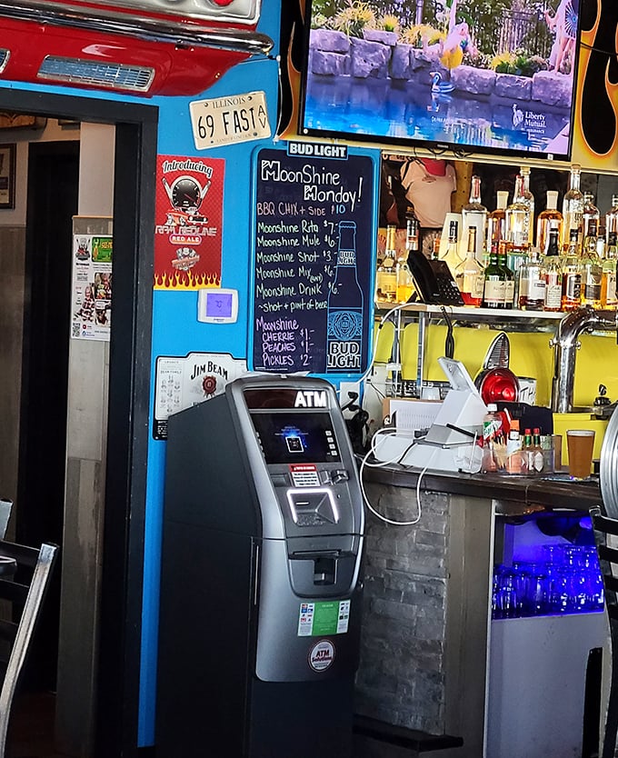 Even the ATM feels on-theme, nestled between vintage signs and moonshine offerings &ndash; because nostalgia may be free, but souvenirs aren't.