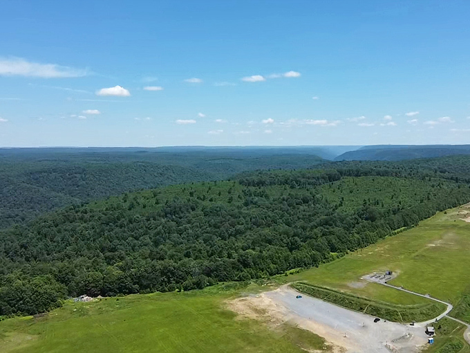 A bird's-eye revelation of Cherry Springs' splendid isolation &ndash; surrounded by the verdant fortress of Susquehannock State Forest.