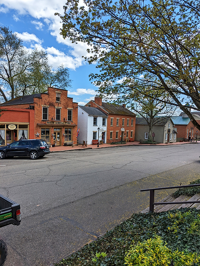 Tree-lined streets showcase the village's commitment to preserving both architectural heritage and natural beauty in perfect harmony.