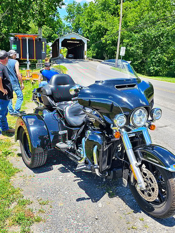 Motorcycle enthusiasts find these bridges irresistible. The contrast between vintage wood engineering and modern chrome creates a uniquely American tableau.