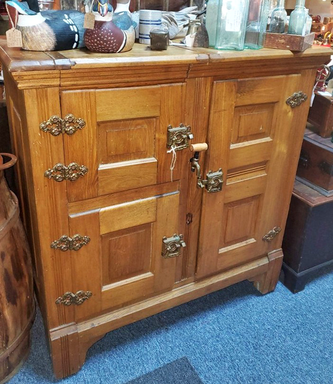 This oak ice chest has more character in its hardware than most modern homes have in their entirety.