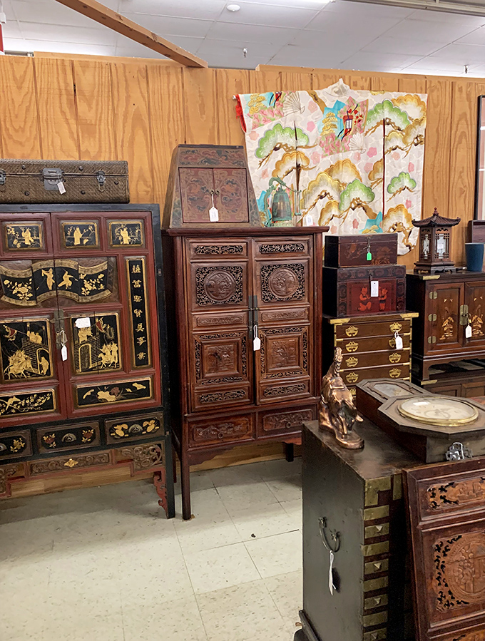 Asian-inspired furniture showcases intricate craftsmanship from another continent and century. Each carved cabinet holds secrets within secrets.