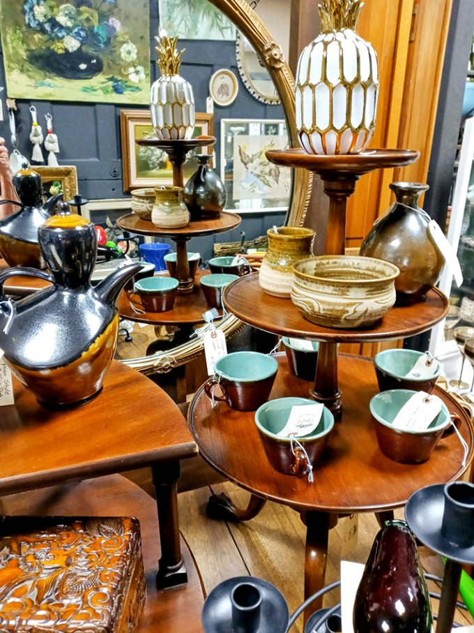 Tiered display stands showcase pottery and vases that would make your dining table look like it belongs in a design magazine.