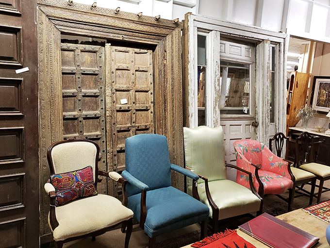 These chairs have heard decades of stories, while those ornate wooden doors have opened to countless possibilities throughout their long lives.