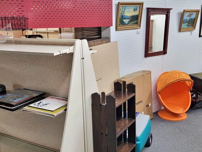 Mid-century modern meets country charm in this corner where every shelf tells a different design story. Marie Kondo would have a meltdown.