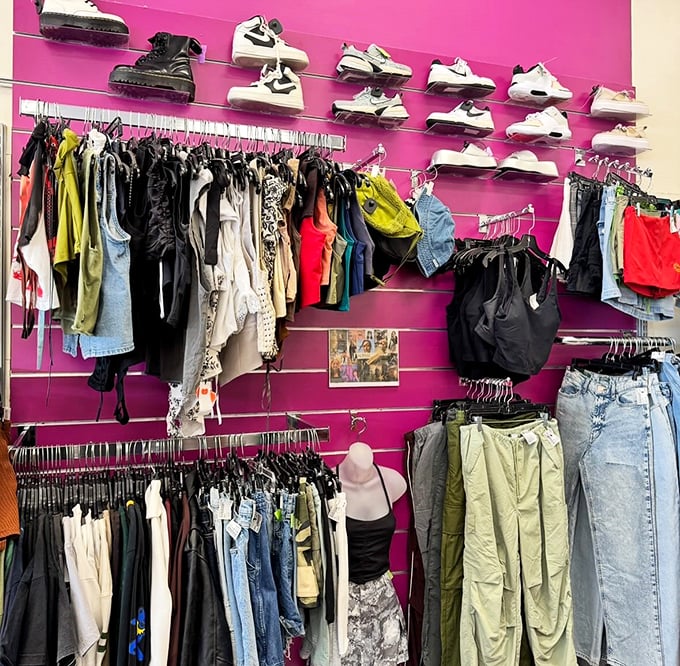 Hot pink walls make these fashion finds pop. The sneaker display above proves someone's "too many shoes" becomes your perfect pair.