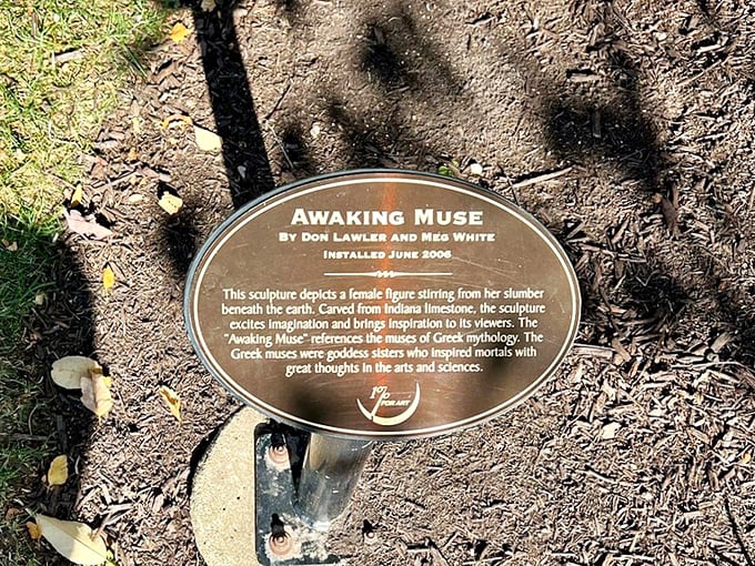 Every great artwork deserves its story told&mdash;this plaque reveals the mythology behind the massive emerging figure nearby.