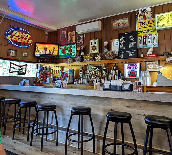 The bar area feels like it's been serving cold beers and warm conversations for generations. Sports on TV, neon signs glowing, and stories being shared.