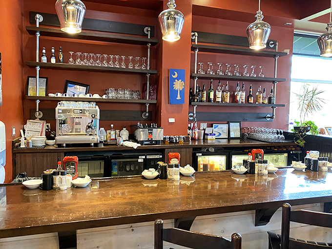 The bar area&mdash;where morning cocktails transform "it's too early" into "it's vacation somewhere" with remarkable efficiency.