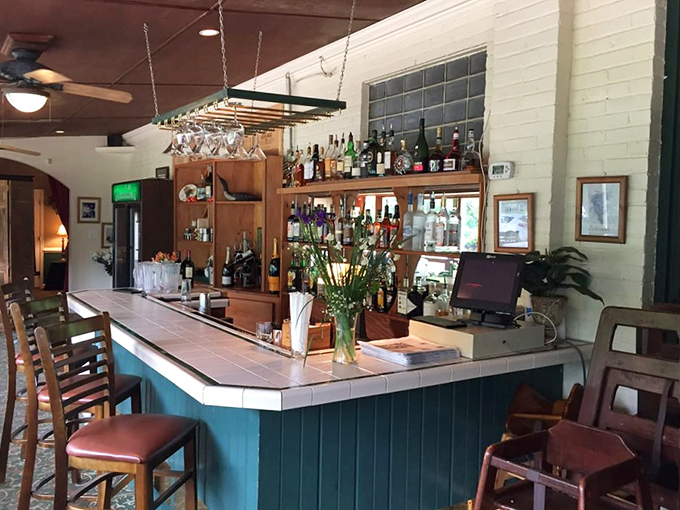 The bar beckons with the promise of perfectly mixed Manhattans and conversations that could stretch pleasantly into the evening.