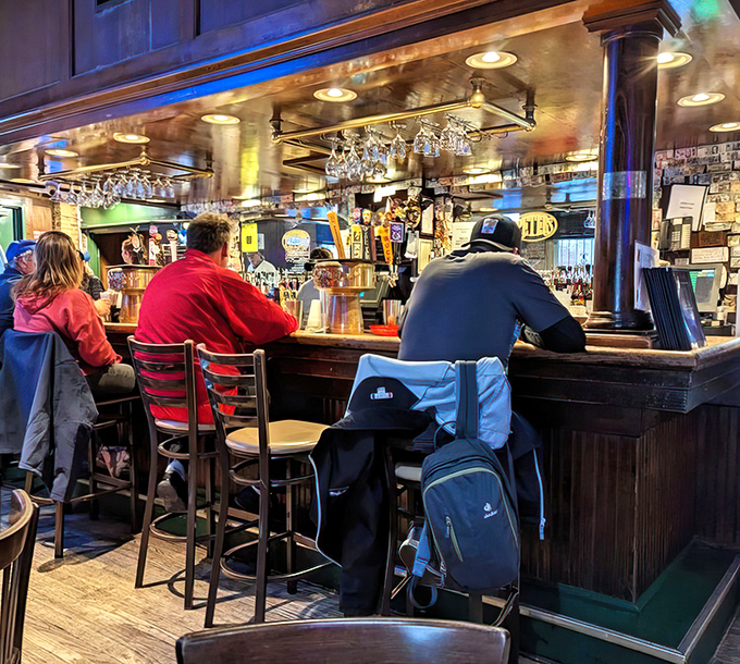 The bar is where stories are exchanged, games are watched, and friendships are forged over perfectly poured pints and local gossip.