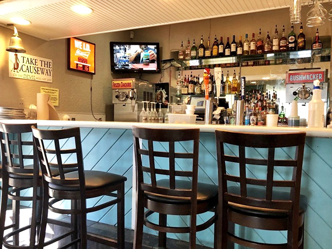 The bar where "I'll just have one drink" turns into three hours of making new friends. Blue paneling and cold beer&mdash;the perfect seafood accompaniment.