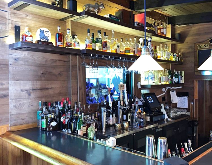 Behind every great meal is a well-stocked bar. This one looks ready to solve whatever problems you brought through the door.