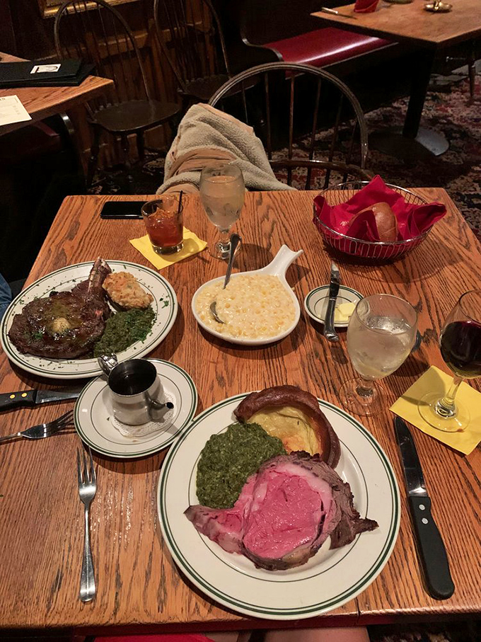 A table that tells the whole story: prime rib, Yorkshire pudding, creamed corn, and spinach&mdash;the Fantastic Four of steakhouse dining.