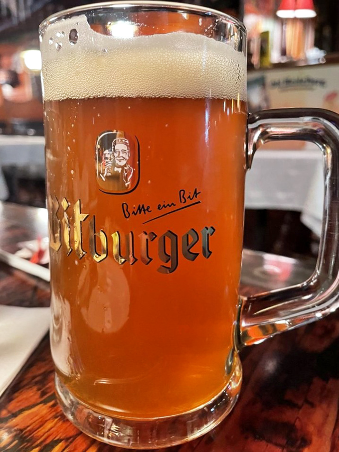 A proper German beer deserves a proper German vessel. This Bitburger stein promises liquid gold with a perfect head—Prost to that!