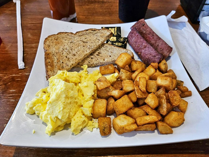 Breakfast simplicity executed perfectly. Those home fries have the kind of crispy exterior that makes you wonder why you ever eat anything else.