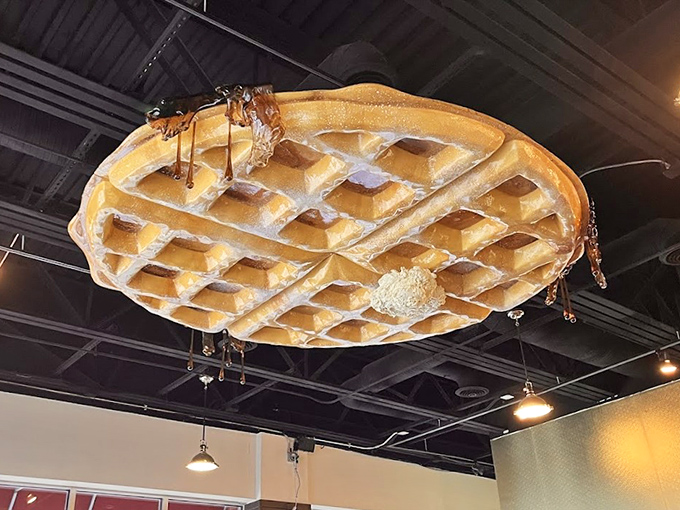 The giant waffle chandelier hanging from the ceiling&mdash;because subtle breakfast decor is for people who don't commit.