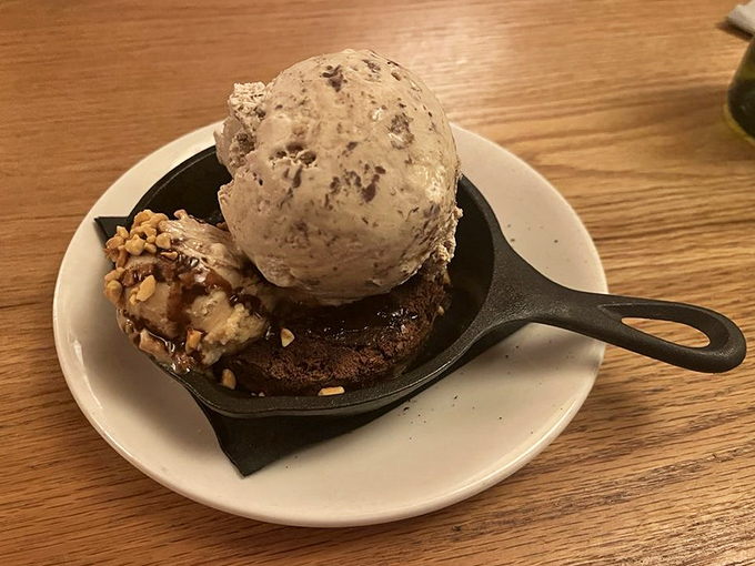Warm brownie meets cold ice cream in the dessert version of "opposites attract." A cast-iron presentation that promises the perfect bite of gooey and crisp.