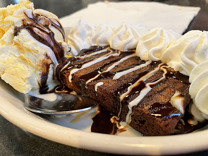 Chocolate brownie meets ice cream in a dessert romance for the ages. Resistance is futile, diets are postponed.
