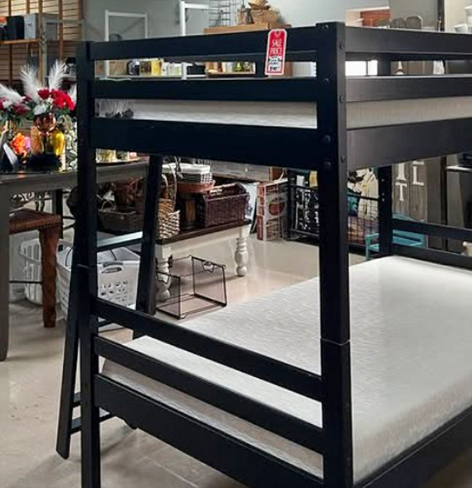 A bunk bed with possibilities! Someone's childhood adventure station or the perfect solution for your guest room dilemma.