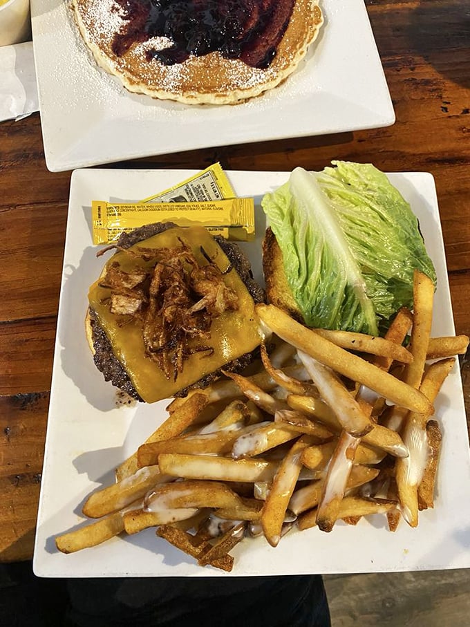 The burger doesn't care that it's at a breakfast joint&mdash;it's confident, cheese-draped, and accompanied by fries that refuse to be overshadowed.