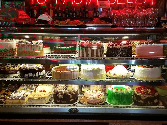 A dessert case that should come with a warning label. Each cake looks like it's auditioning for a starring role in your sweetest dreams.