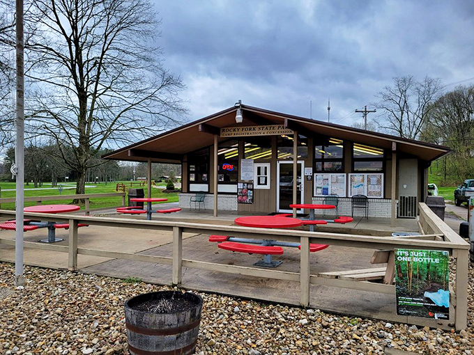 The park office stands ready to welcome visitors, surrounded by picnic tables that have hosted countless family memories and mustard stains.