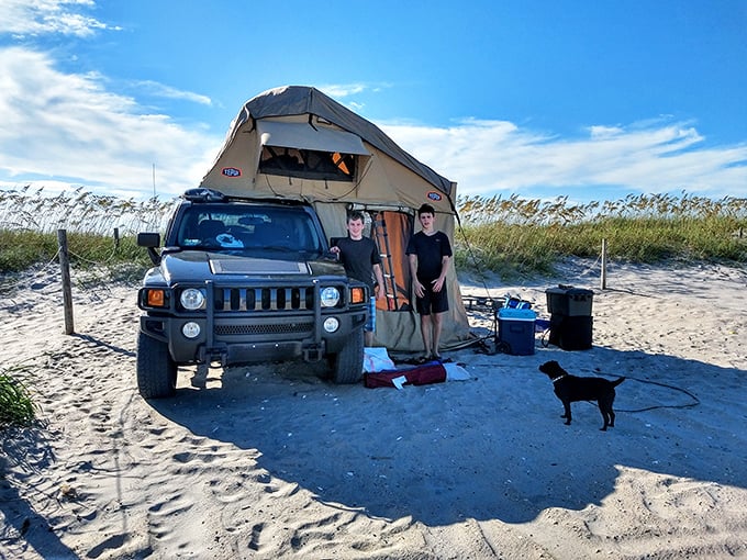 Beach camping elevated to an art form. When your backyard is the Atlantic Ocean, morning coffee hits differently.