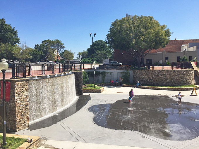 Carolina Wren Park's splash pad transforms summer afternoons into childhood joy&mdash;proving you're never too old to dash through fountains on a hot day.