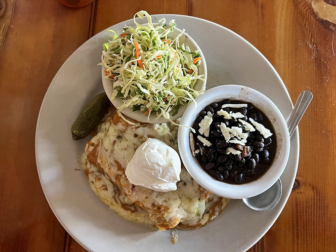 Chicken enchiladas swimming in creamy suiza sauce deliver authentic flavors that warm the soul completely.