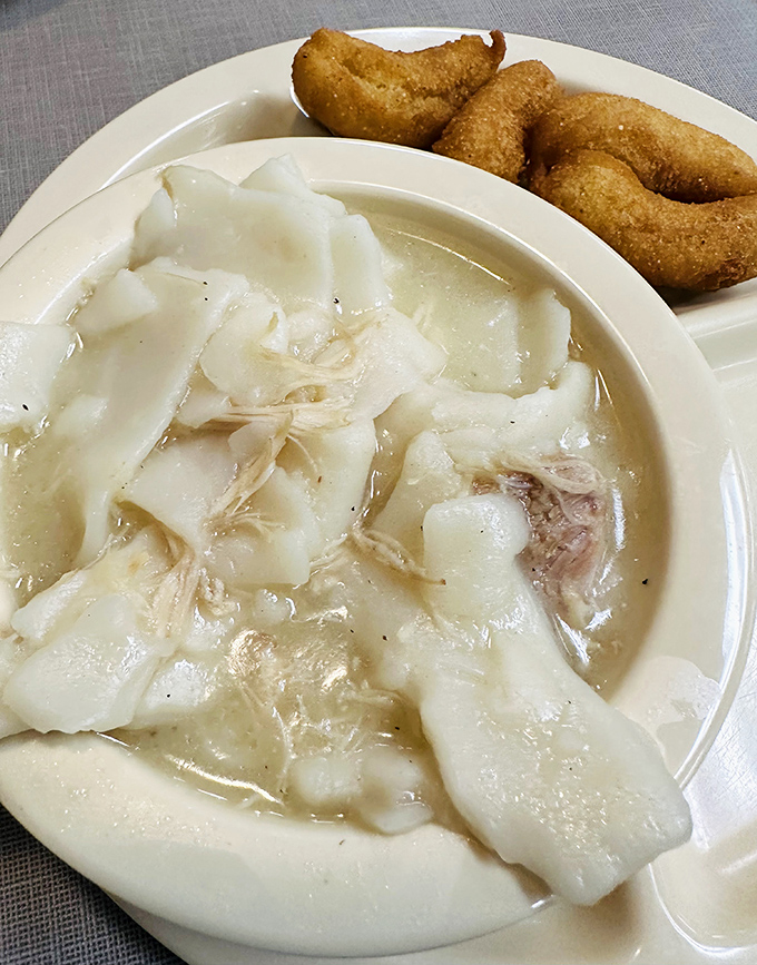 Chicken and pastry&mdash;the South's answer to chicken noodle soup. Pure comfort in a bowl with hush puppies standing by for dipping duty.