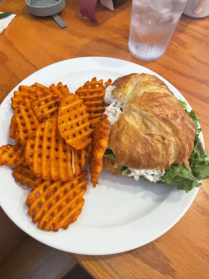 A sandwich so perfectly executed it deserves its own theme music, with sweet potato waffle fries stealing the spotlight like talented supporting actors.