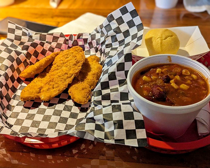Comfort food companionship at its finest&mdash;golden chicken tenders keeping a steaming bowl of brisket chili company like old friends catching up.
