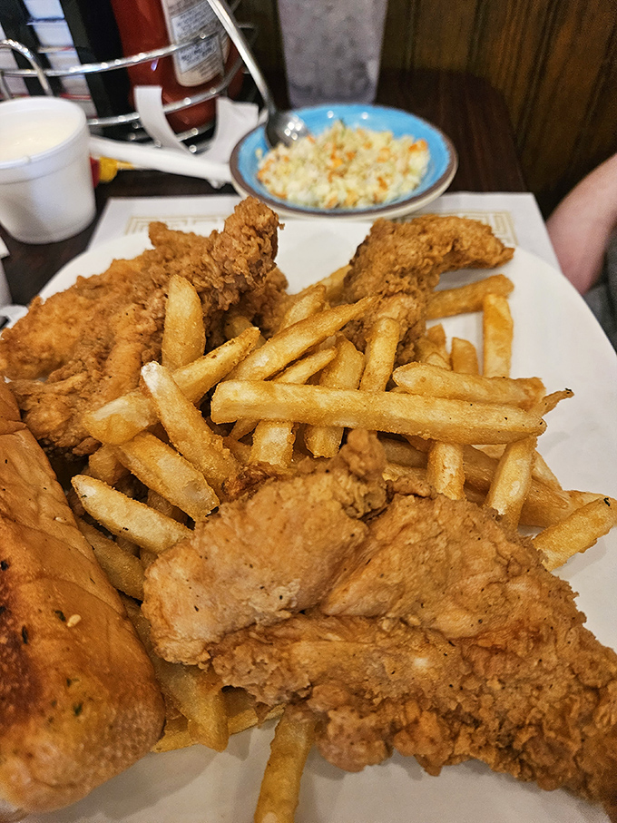 Chicken tenders that actually deserve the name "tender," with fries that could make a Frenchman weep with joy. Comfort food perfection on a plate.