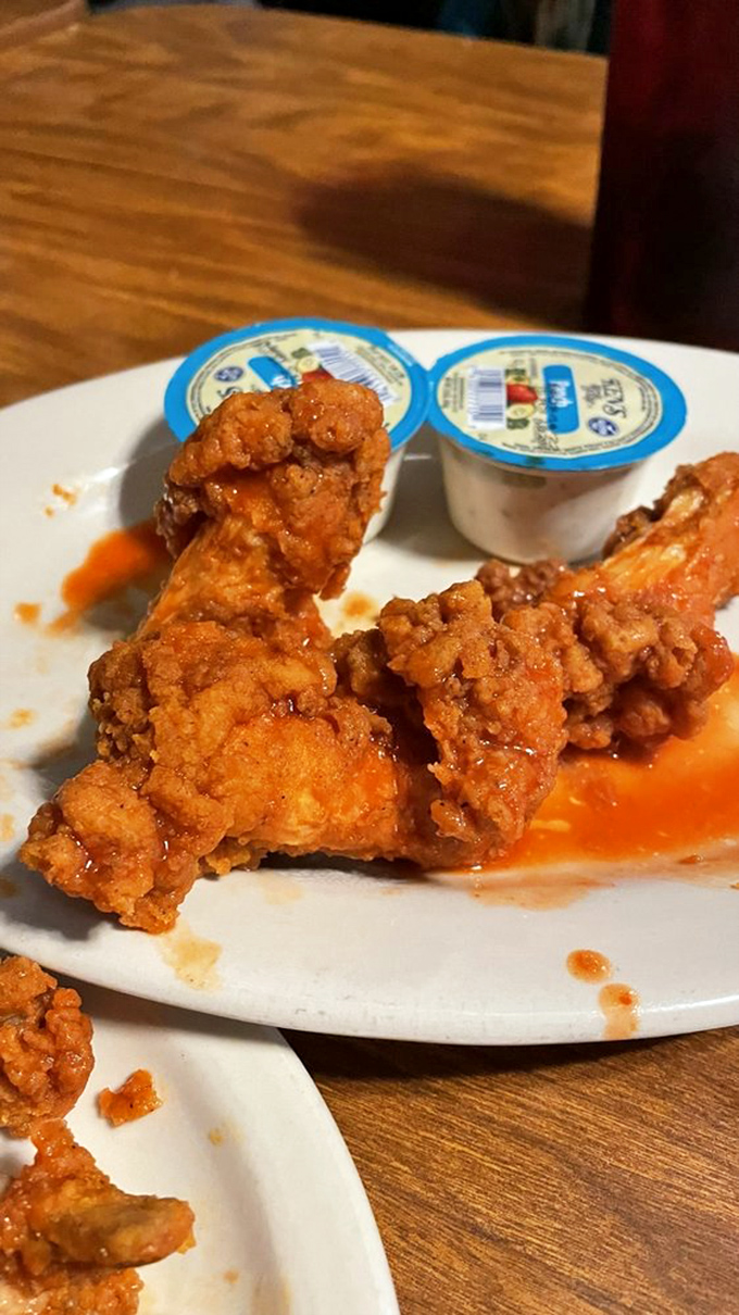 These aren't just wings—they're proof that B & J's mastery extends beyond seafood. Buffalo sauce never had it so good.